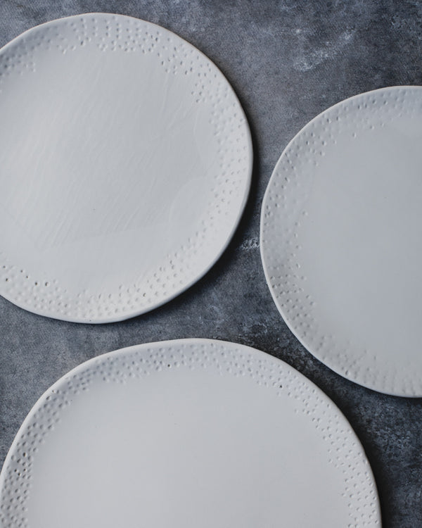 Coral rim white satin plates - Clay Beehive